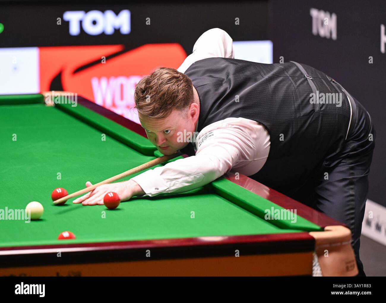 Sheffield, UK. 22nd Apr, 2025. Shaun Murphy takes a shot during his ...