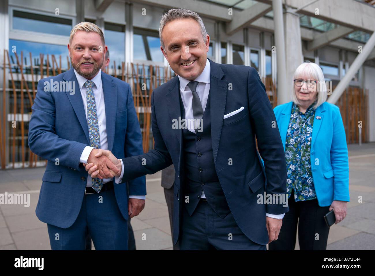 Scottish Liberal Democrat leader Alex Cole-Hamilton (centre) and fellow ...