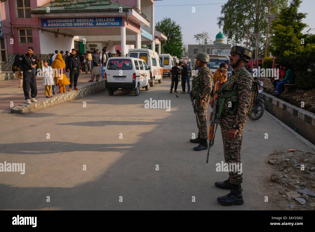 Indian security officers stands guard at a hospital in Anantnag after ...