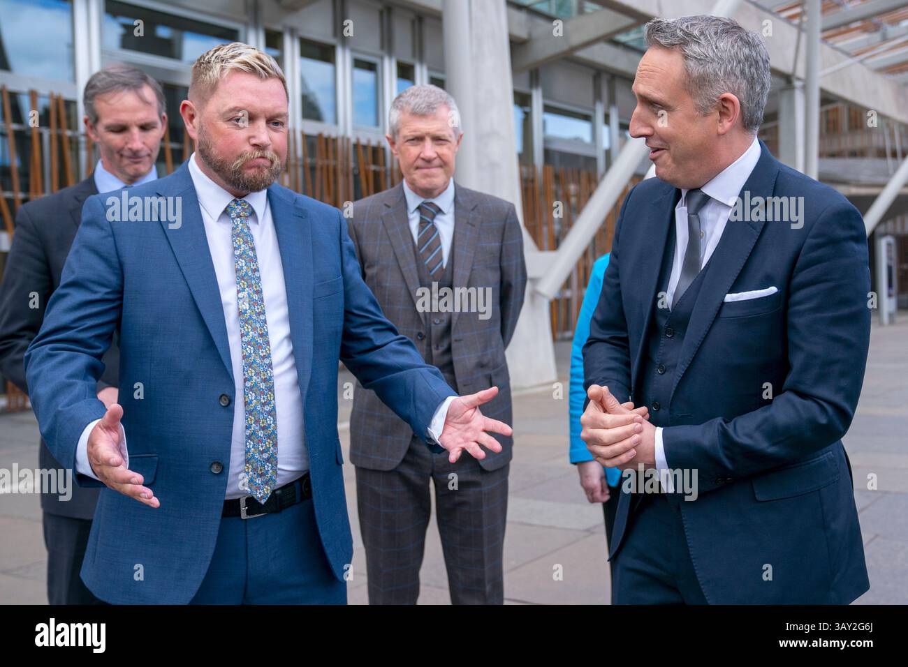 Scottish Liberal Democrat leader Alex Cole-Hamilton (right) and fellow ...