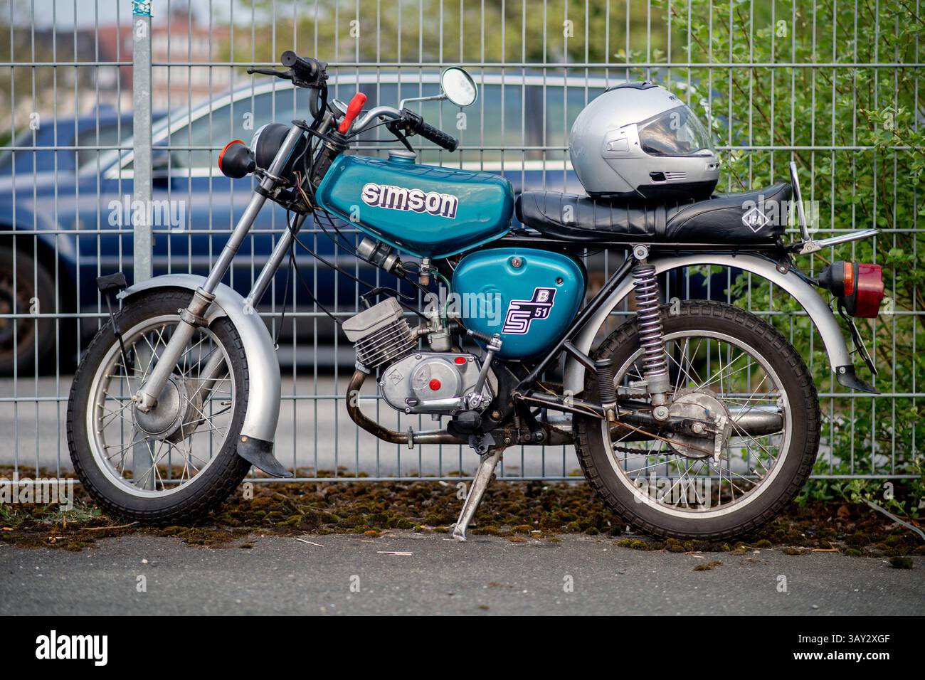 Oldenburg, Germany. 22nd Apr, 2025. A Simson S 51 B moped stands in a parking lot. The moped was ...