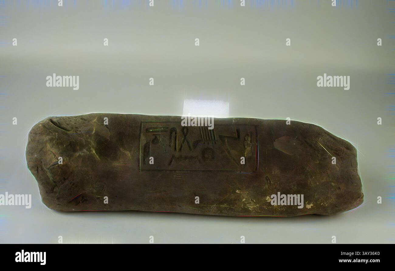 An ancient stone tablet featuring intricate hieroglyphs, depicting ...