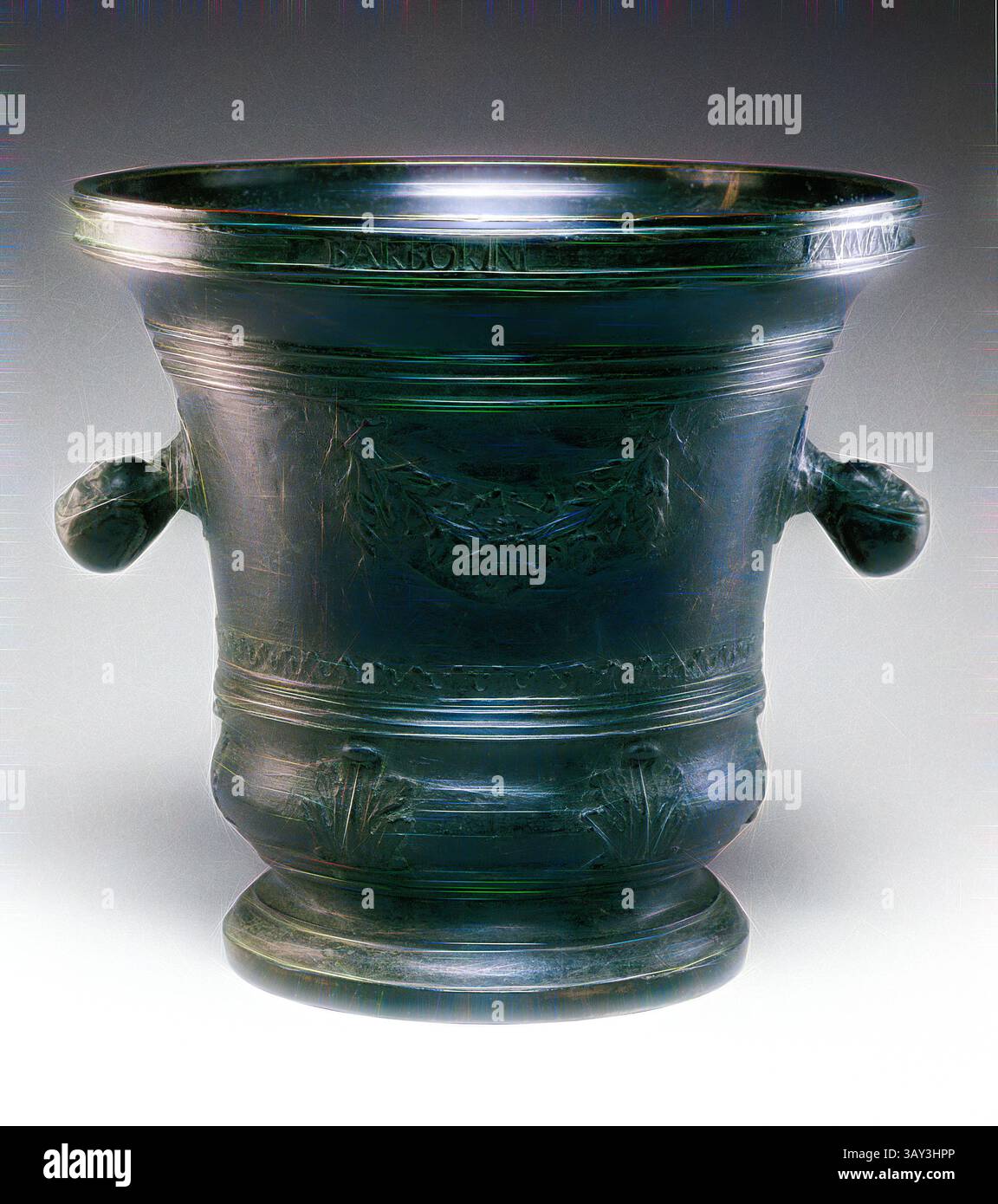 An intricately designed ancient vessel featuring detailed relief ...