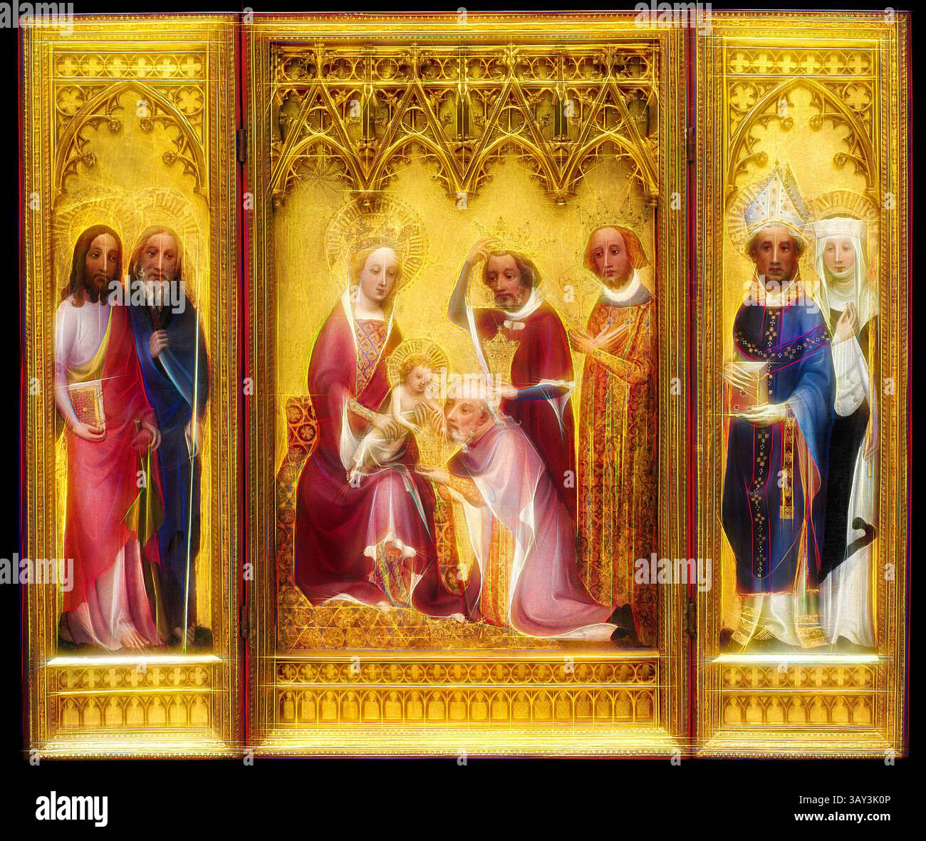 A detailed altarpiece featuring religious figures, including Mary and ...