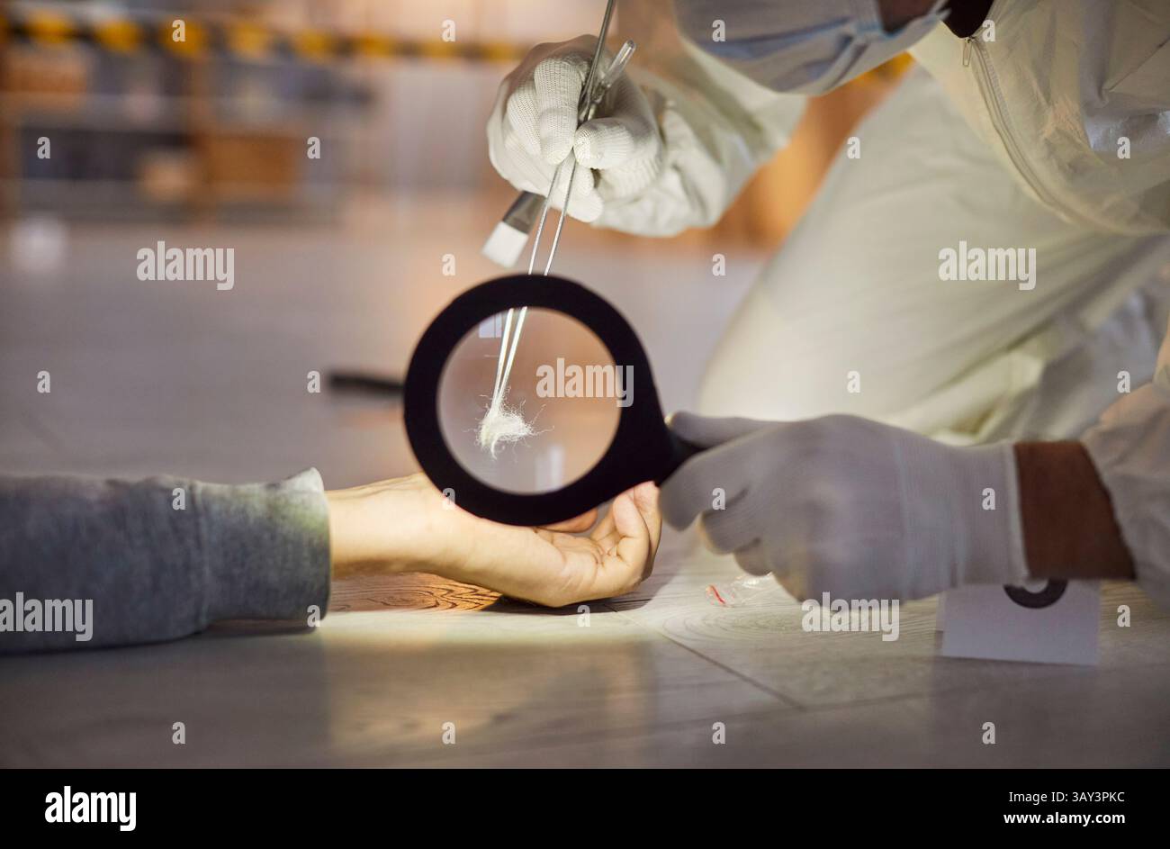 Murder investigation with magnifying glass, evidence study, crime scene ...