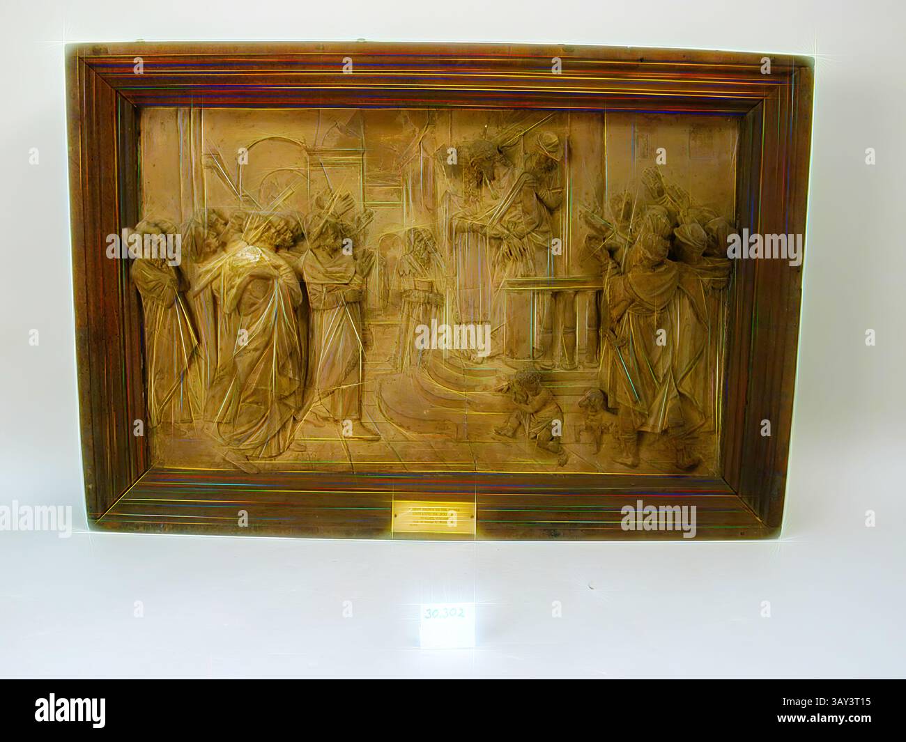 A detailed relief sculpture depicting a historical or religious scene ...