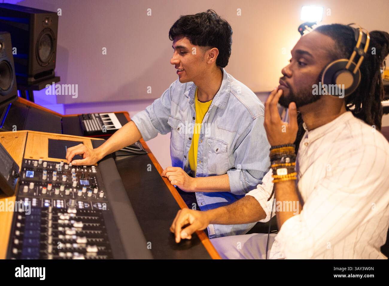 Man using mixing console black hi-res stock photography and images - Alamy