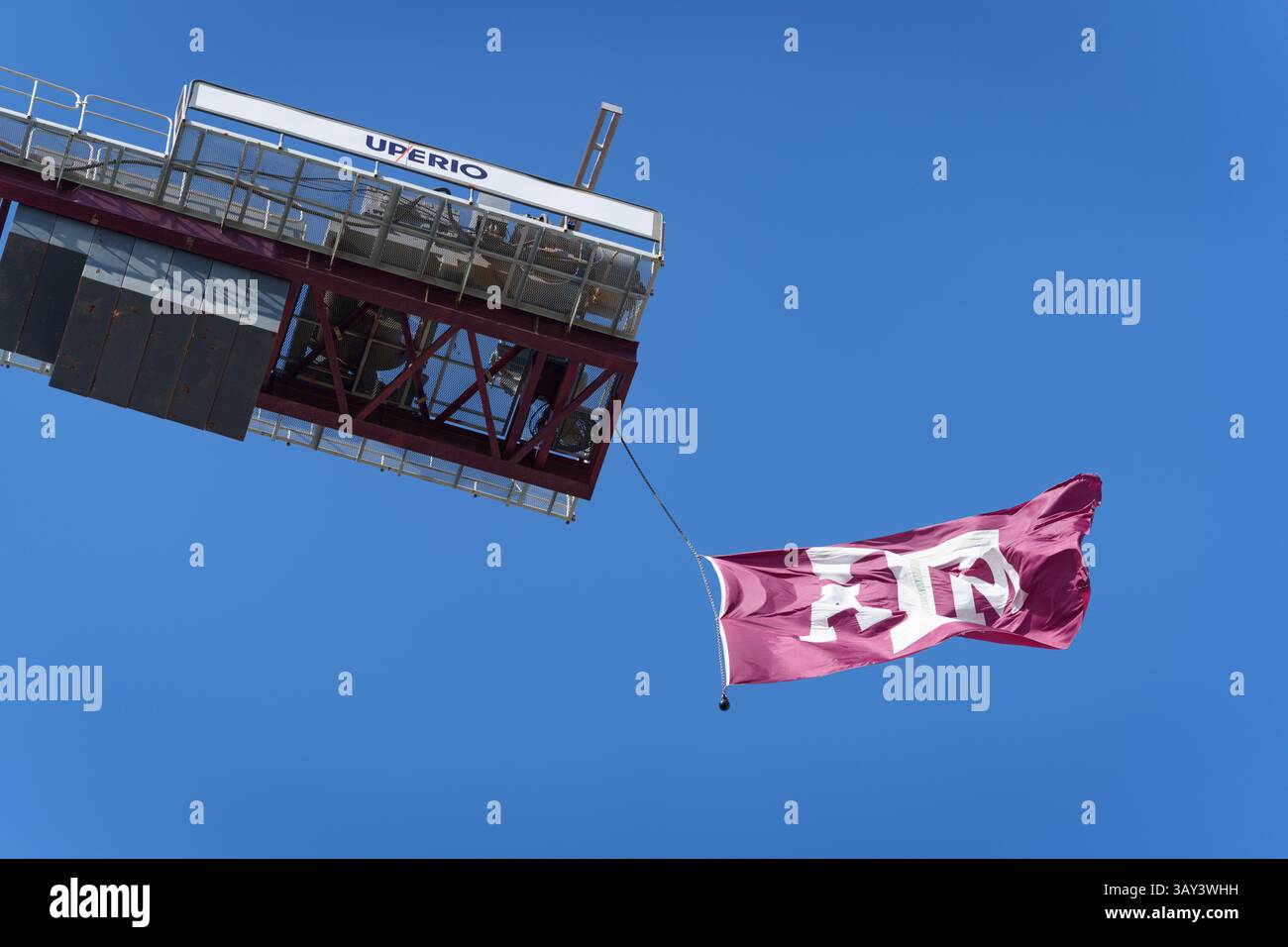 Texas A&M University flag proudly flies from construction crane at the ...
