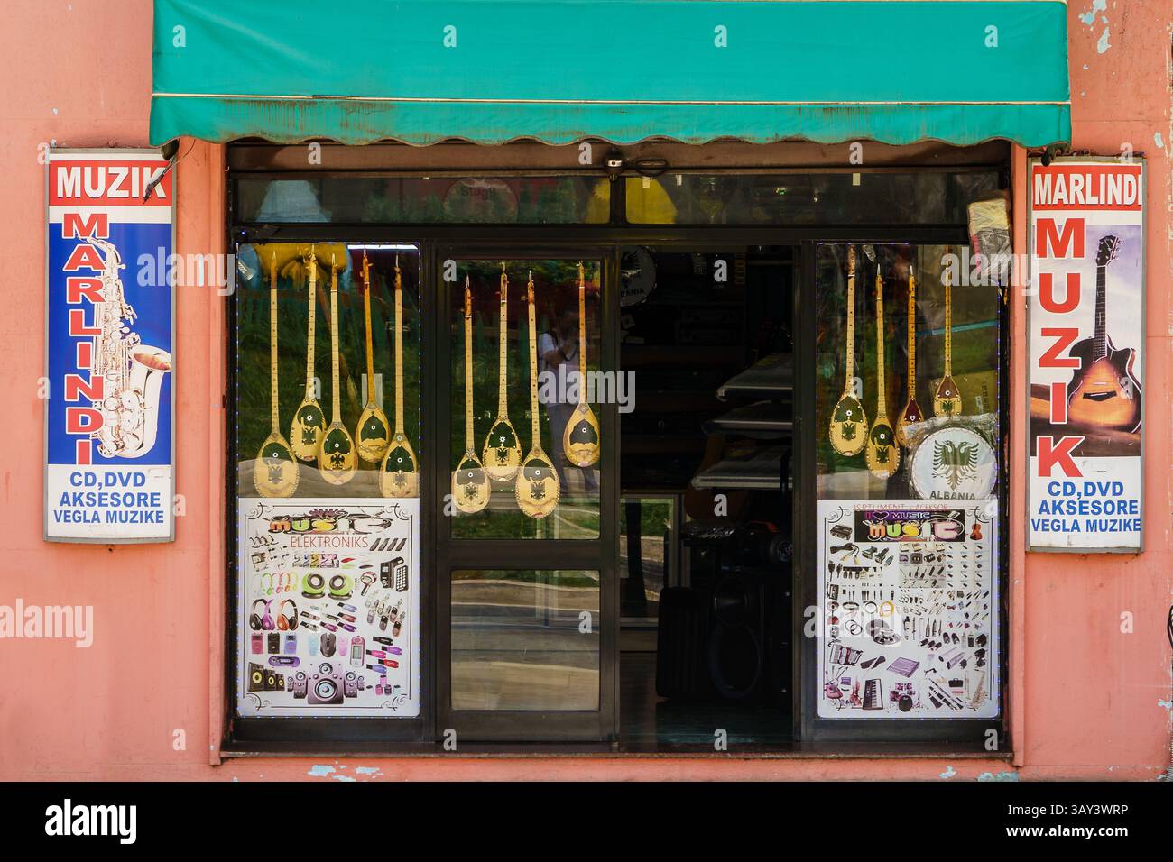 May 2024. Durres, Albania. A music shop with traditional Albanian ...