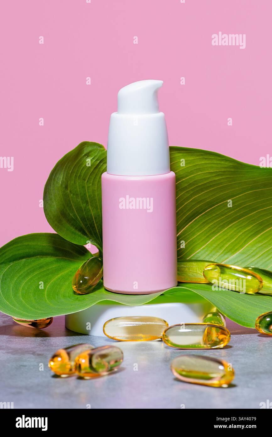 Elegant pink skincare dispenser with a white pump nozzle, framed by a ...