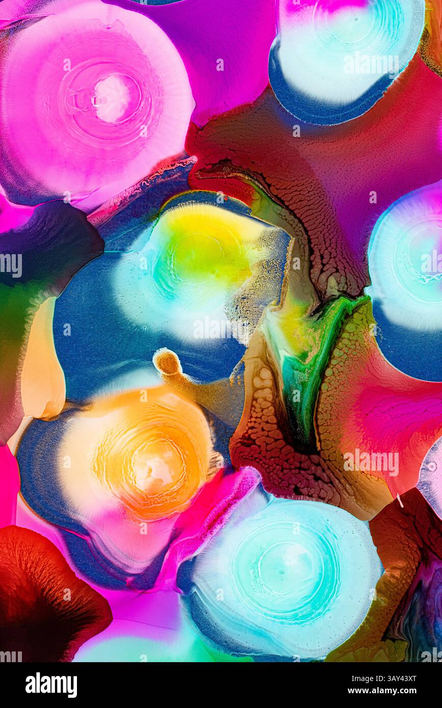 A mesmerizing array of vibrant ink swirls in bright shades of pink ...