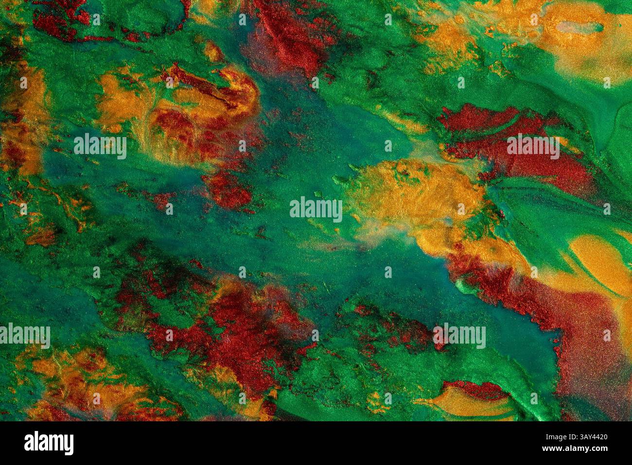 Vibrant swirls of metallic green and red paint create a textured ...