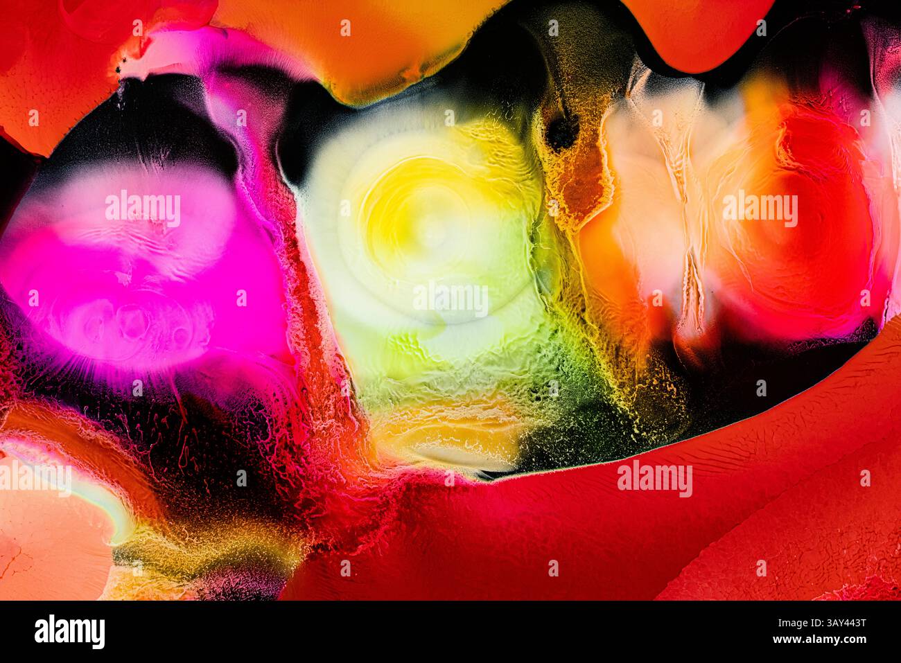 A captivating abstract artwork featuring vivid colors and liquids ...