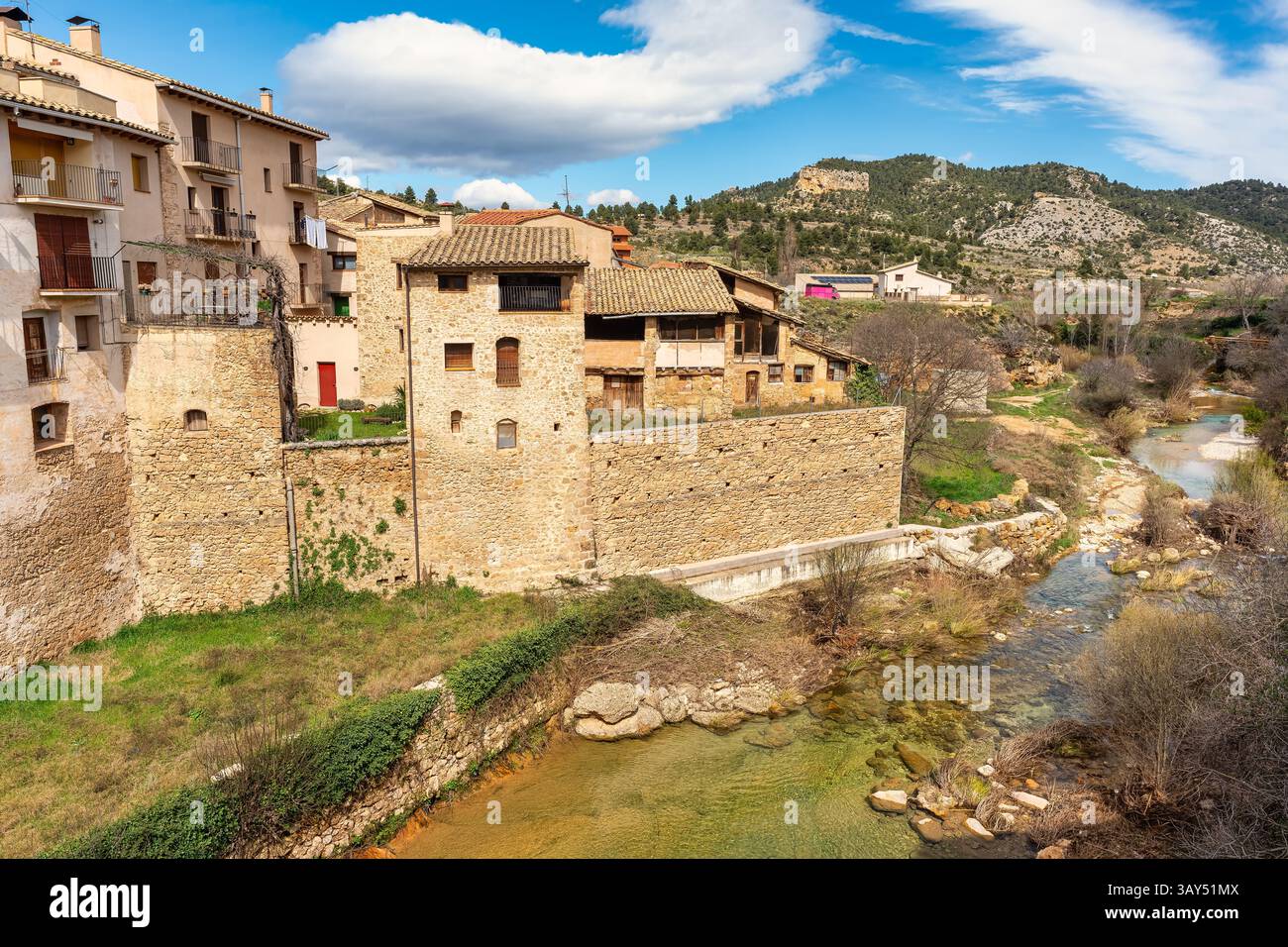Old stone houses by the river in the town of Beceite, Teruel, Aragon ...