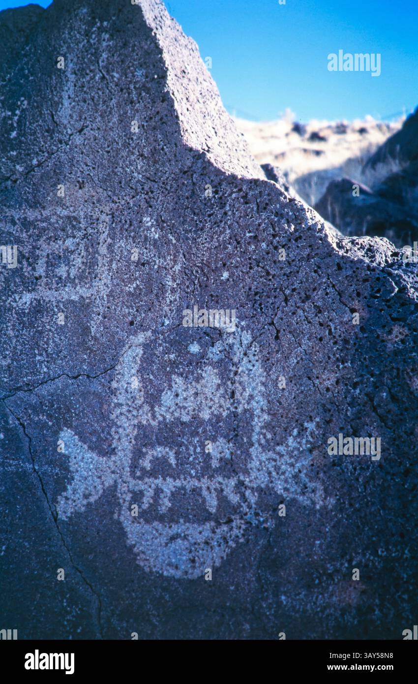 Ancient Native American petroglyphs carved into rocks at the Petroglyph ...