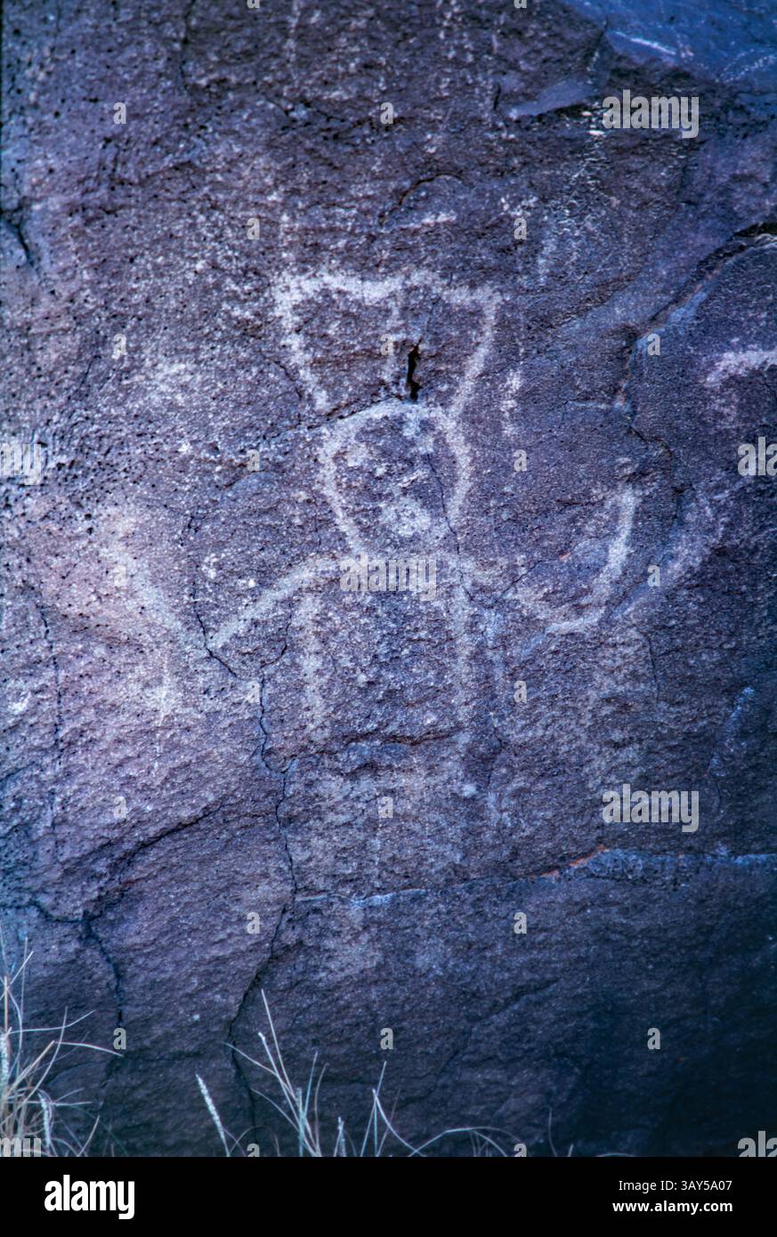 Ancient Native American petroglyphs carved into rocks at the Petroglyph ...