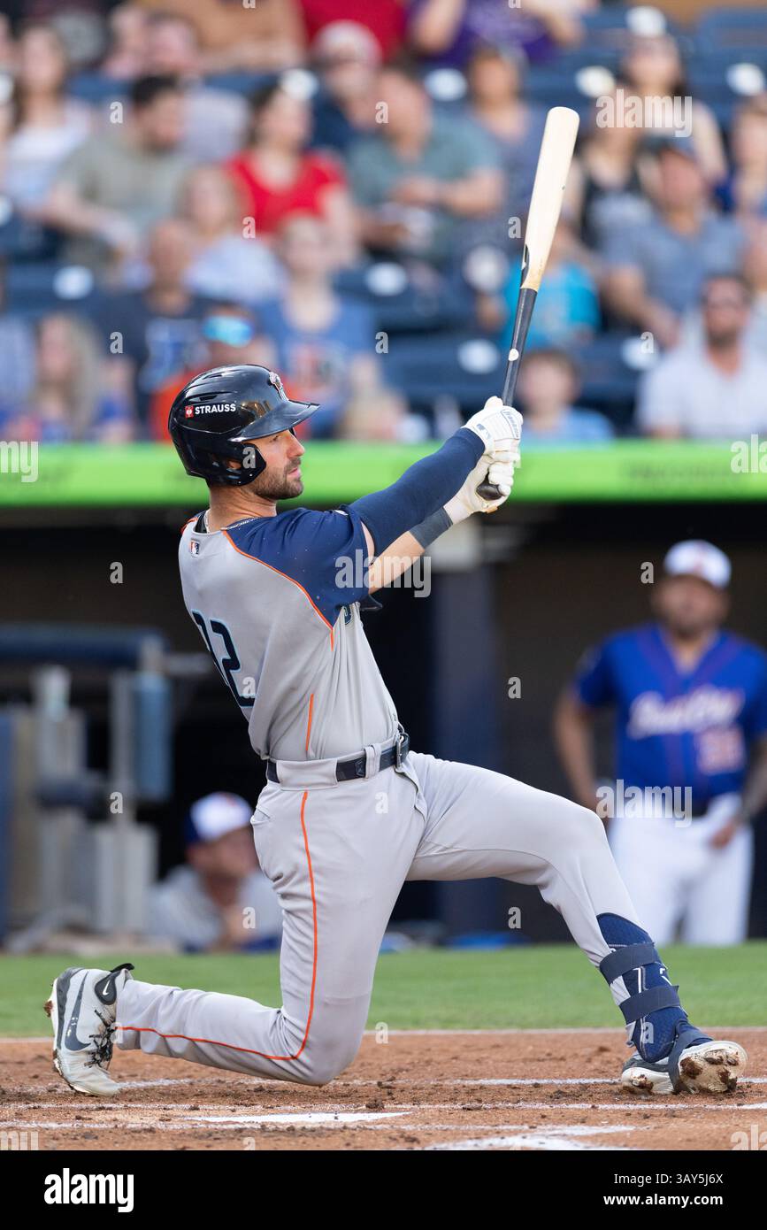 Durham, NC: Sugar Land Space Cowboys catcher Collin Price (32) flies ...