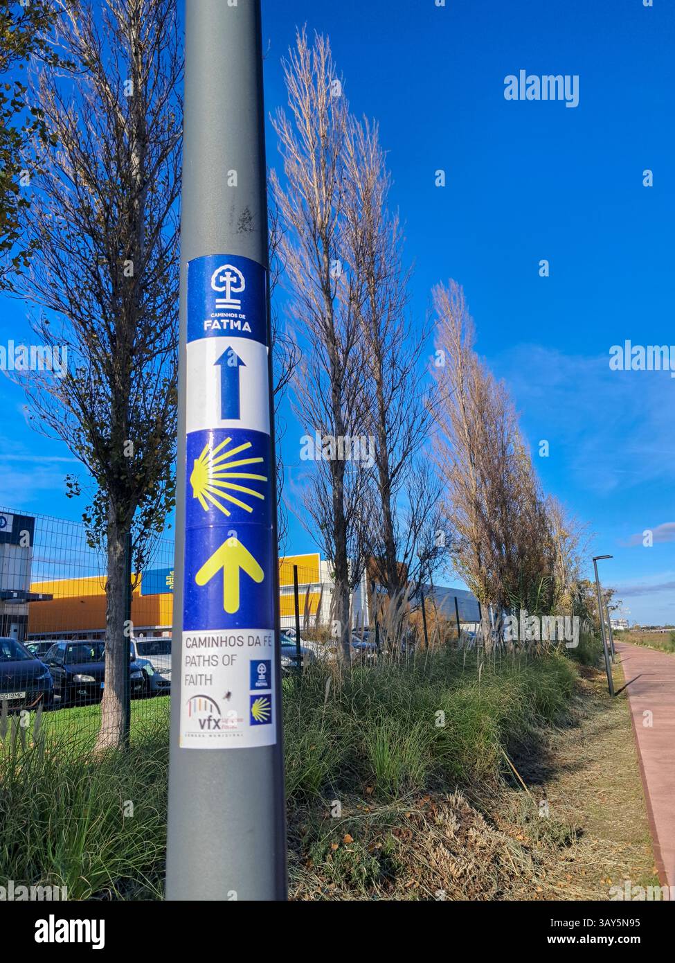 Signpost indicating the way to fatima, a major catholic pilgrimage site ...