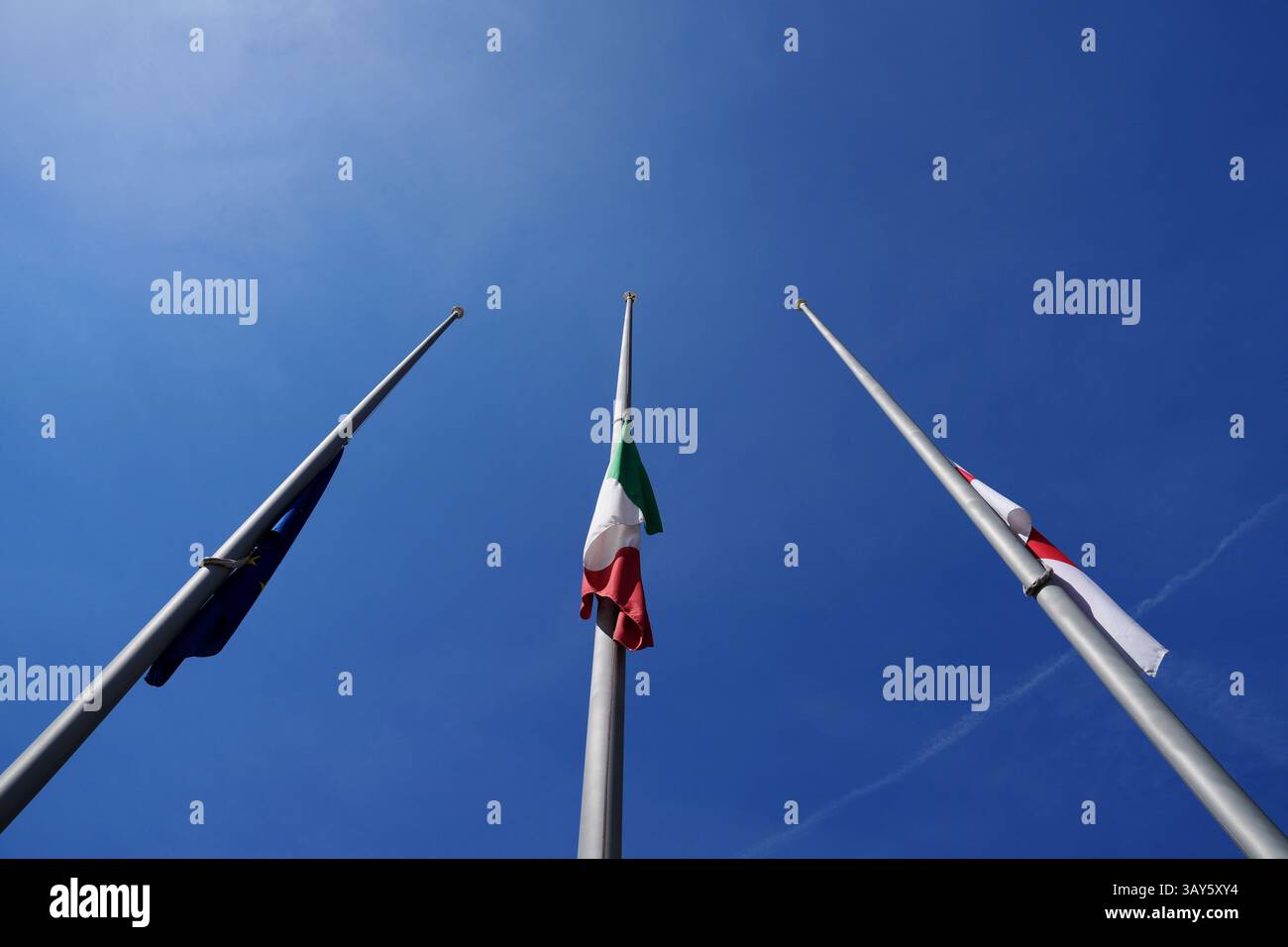 Milan, Italy. 22nd Apr, 2025. Milan, Flags at half-mast as a sign of ...