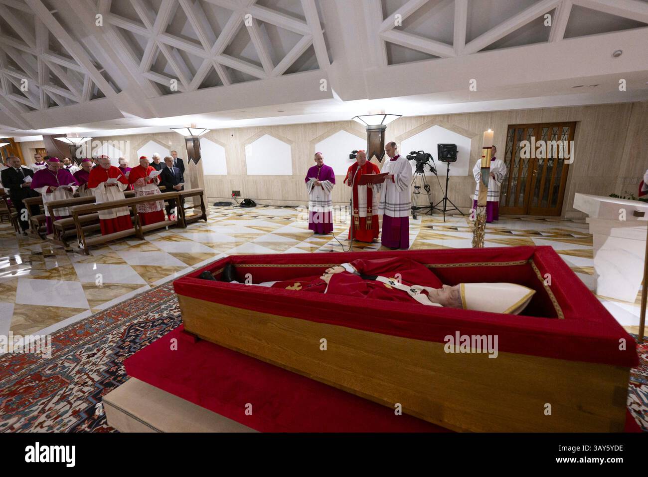 Non Exclusive: The body of Pope Francis is placed in an open casket ...