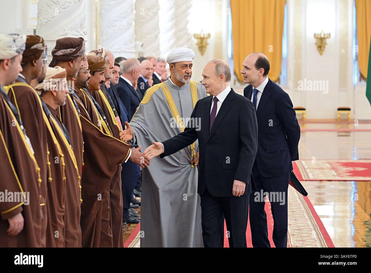 Russian President Vladimir Putin (second from right) and Oman's Sultan ...