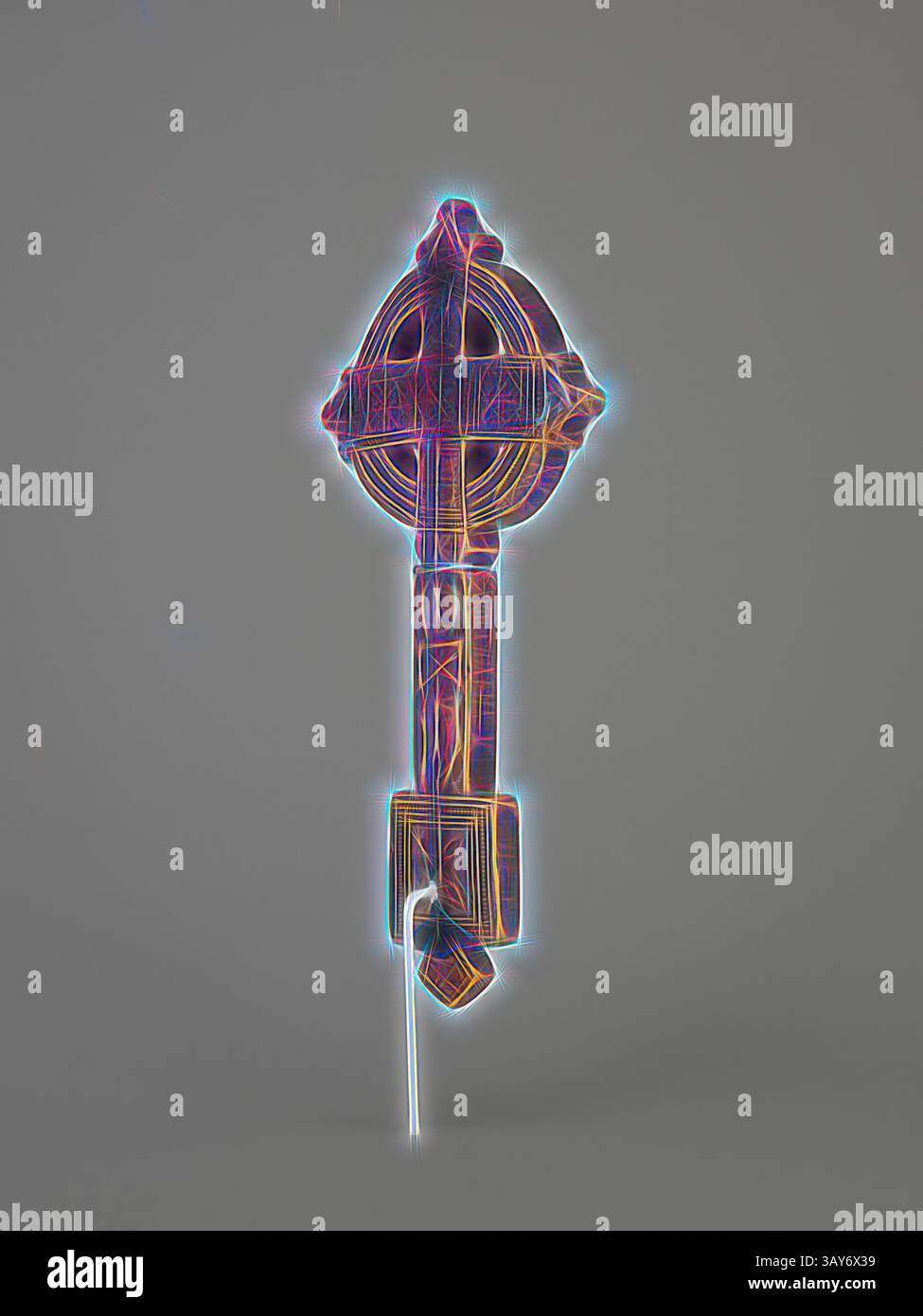 An intricately designed scepter featuring ornate patterns and a ...