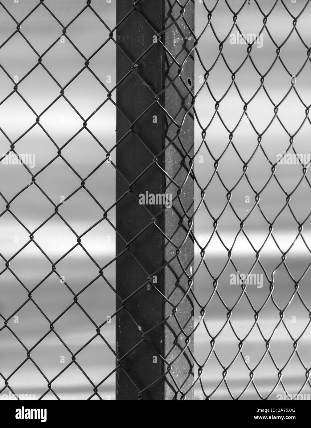 Around the Corner — Chain Link Fence and Green Metal Post Stock Photo - Alamy