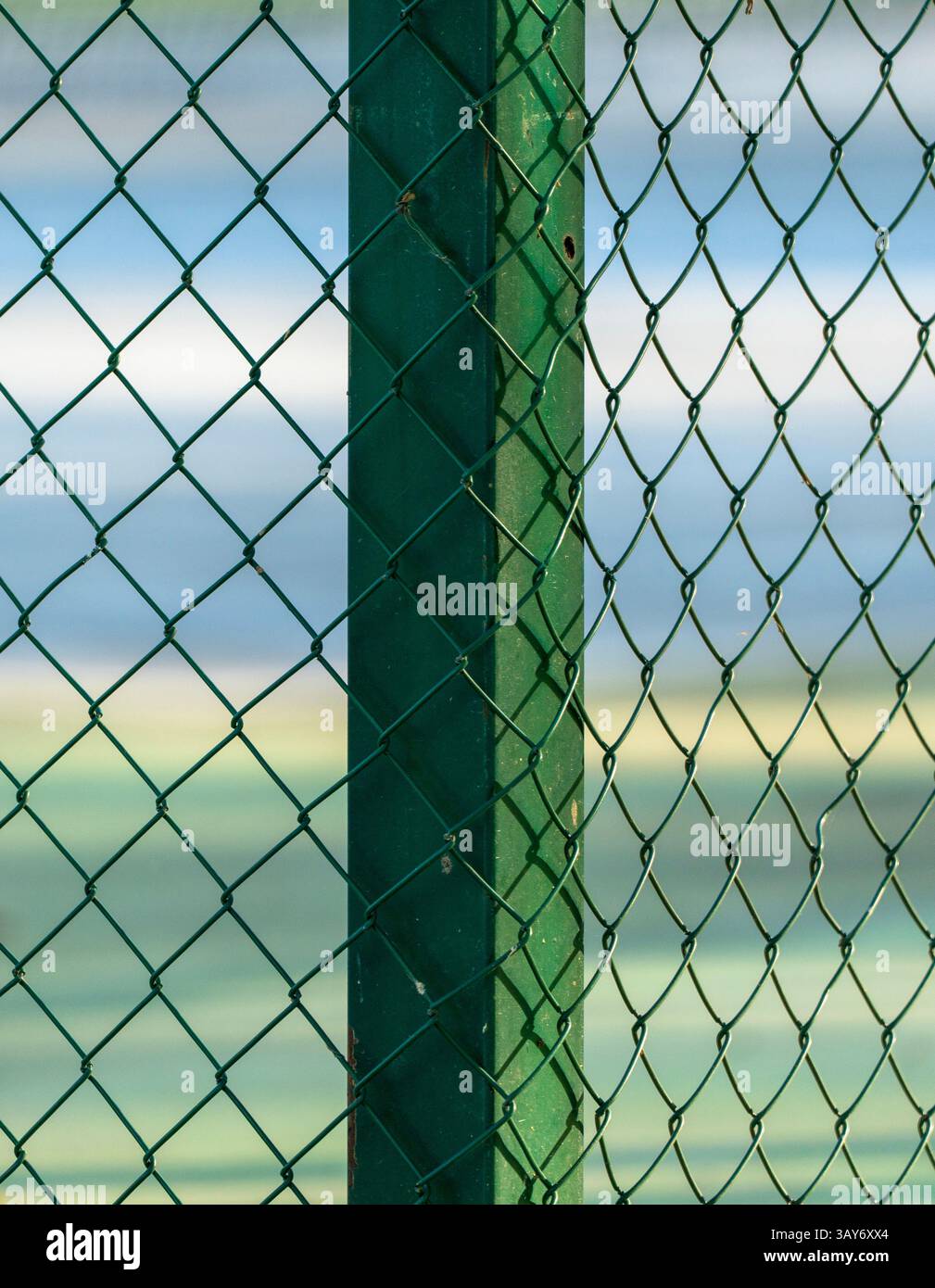 Around the Corner — Chain Link Fence and Green Metal Post Stock Photo ...