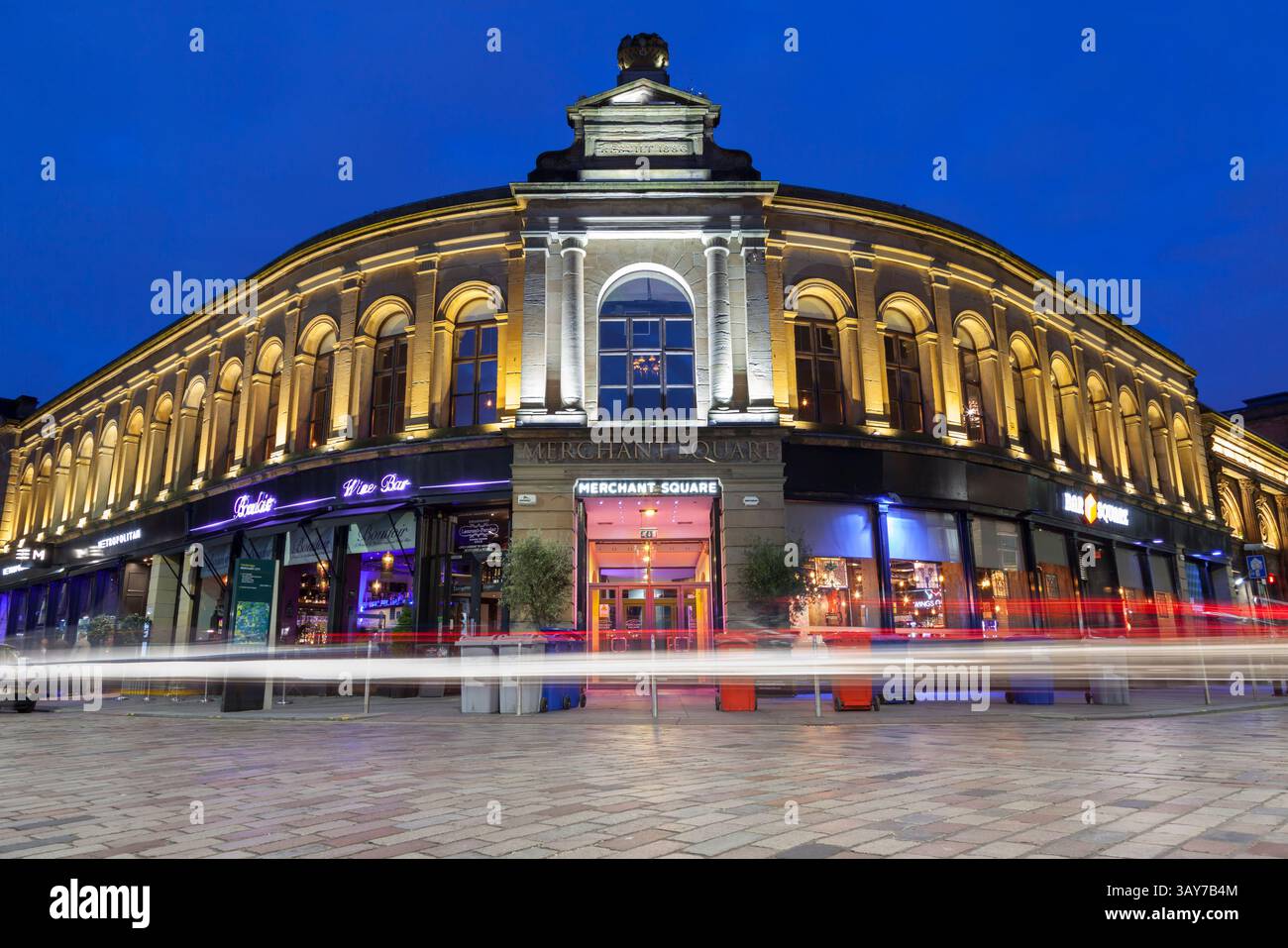 The facade of the Merchant Square in Glasgow's Merchant City area lit ...