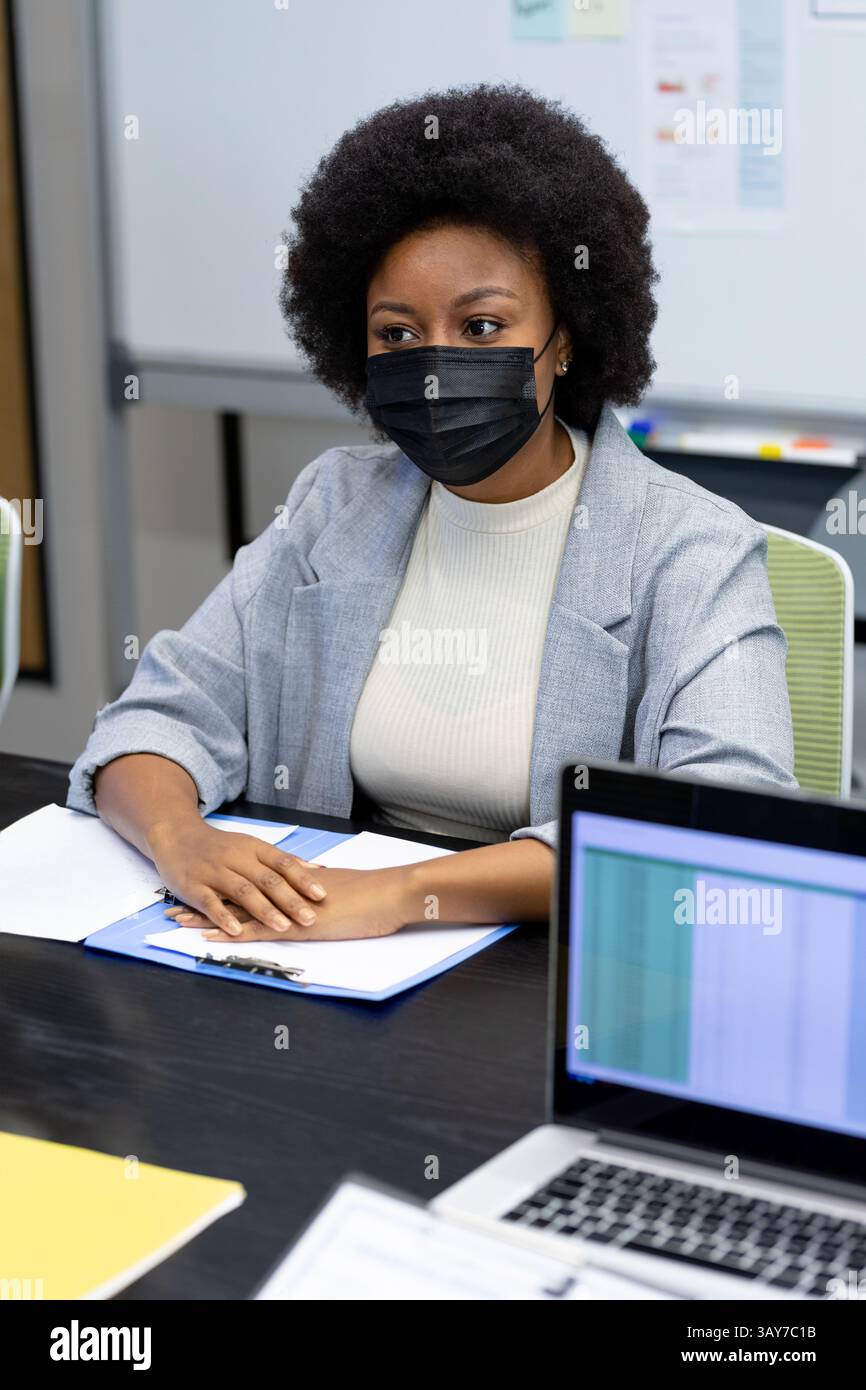 Professional woman reviewing sticky hi-res stock photography and images ...