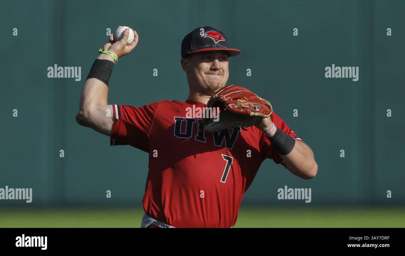 Incarnate Word infielder Tyler Cowan throws during an NCAA baseball ...