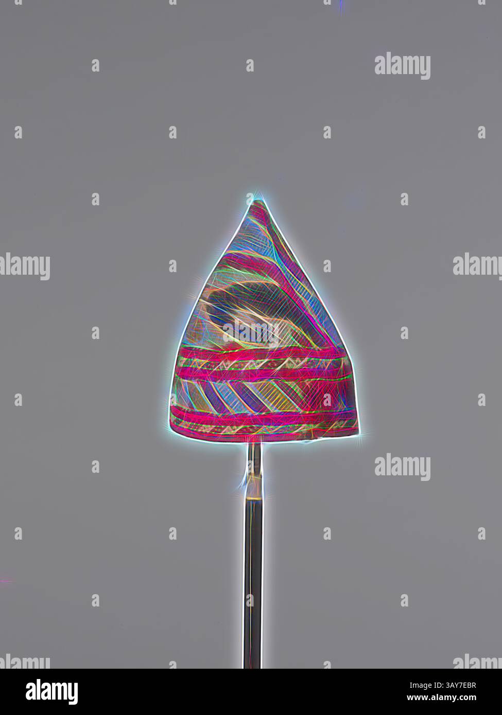 A colorful, conical hat with intricate patterns is displayed atop a ...