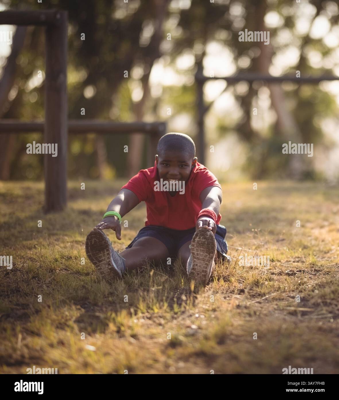 African american boy stretching hi-res stock photography and images - Alamy