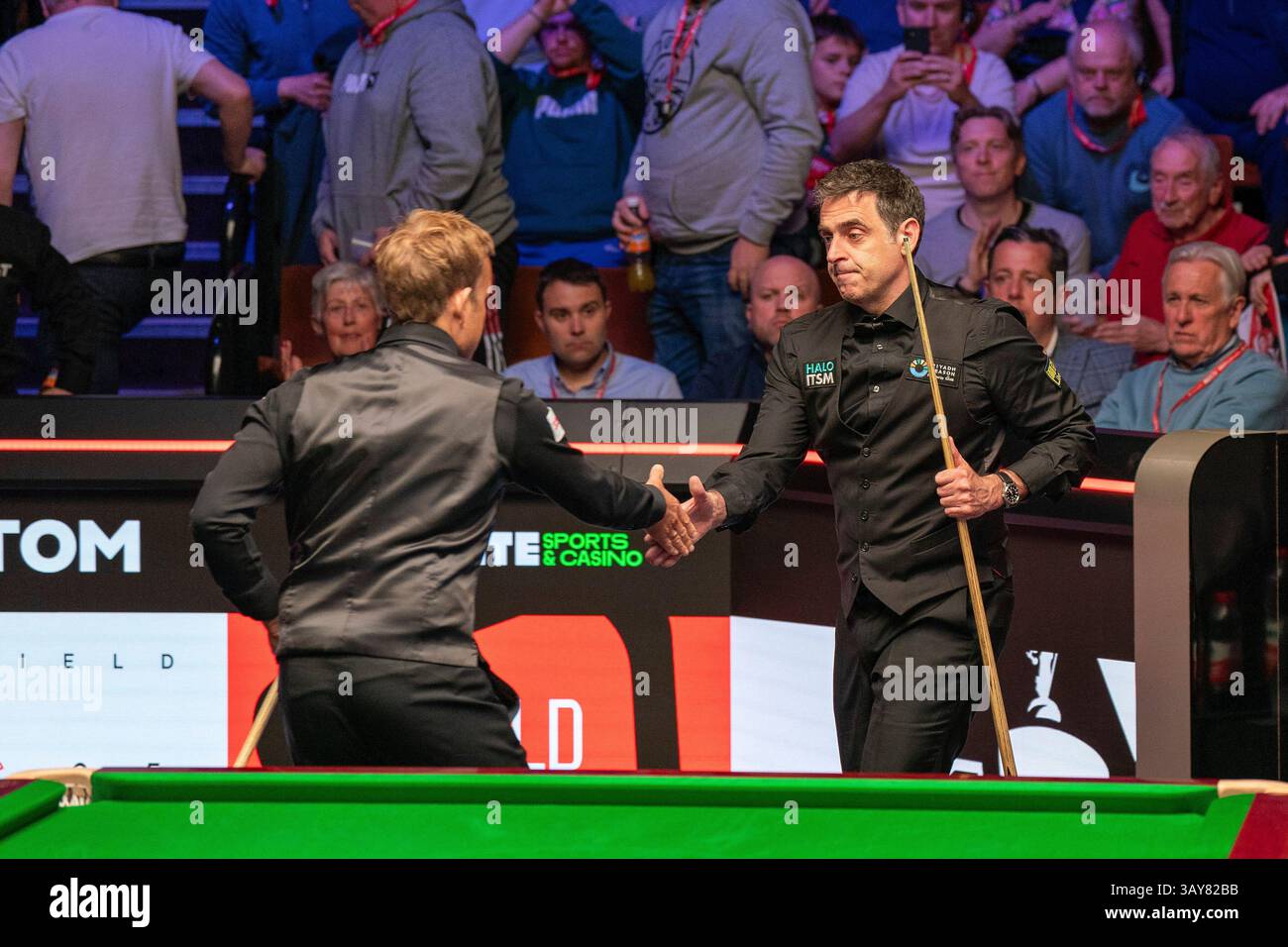 Sheffield, UK. 22nd Apr, 2025. Ronnie O'Sullivan shakes hands with Ali ...