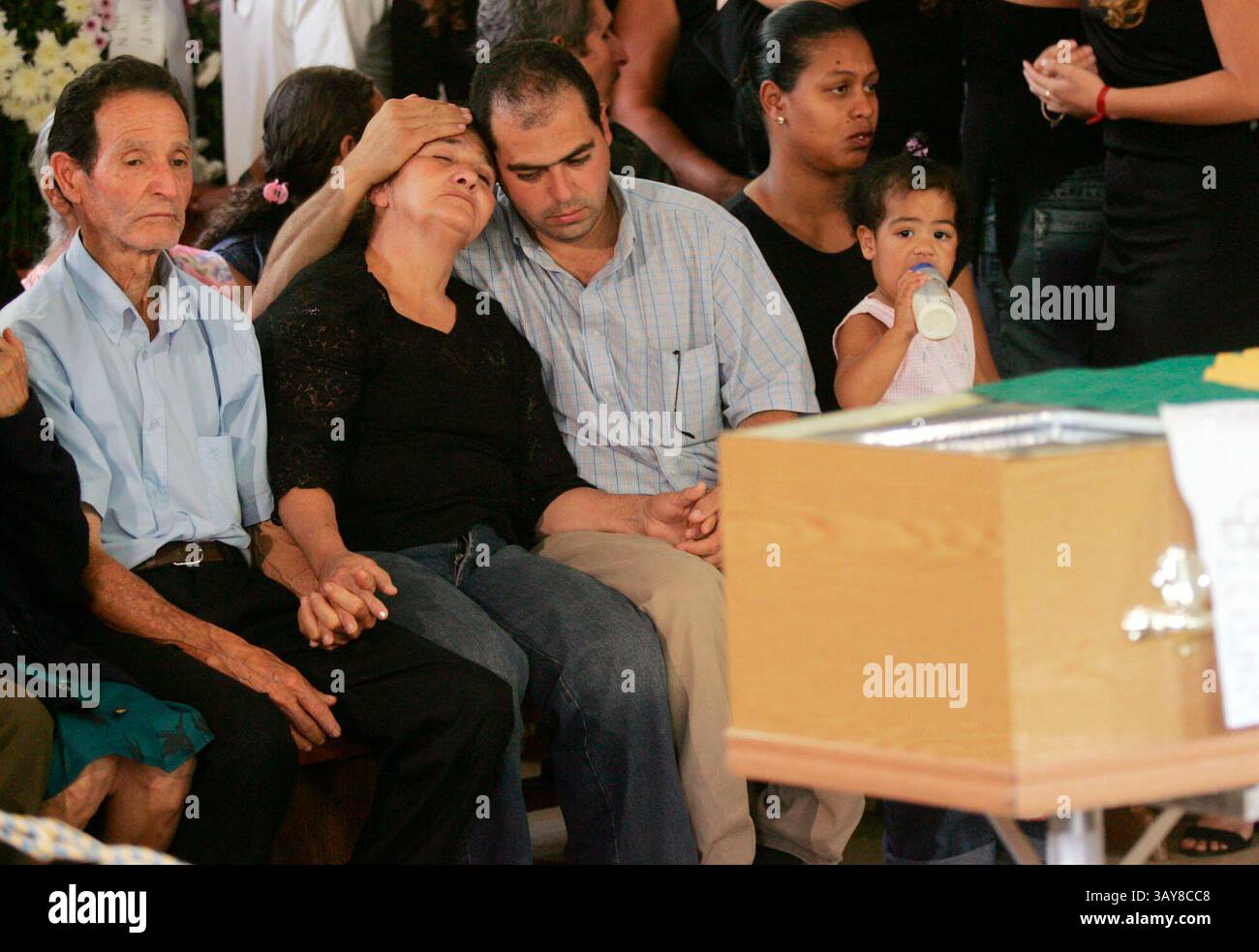 FILE - Maria Menezes, second left, is flanked by Matzinhos da Silva ...