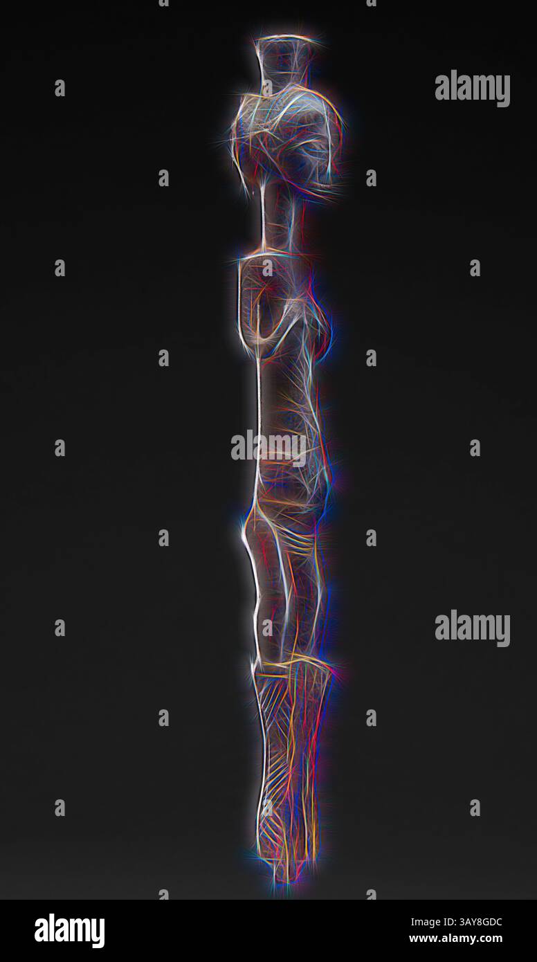 A tall, intricately carved figure stands upright, showcasing an ...