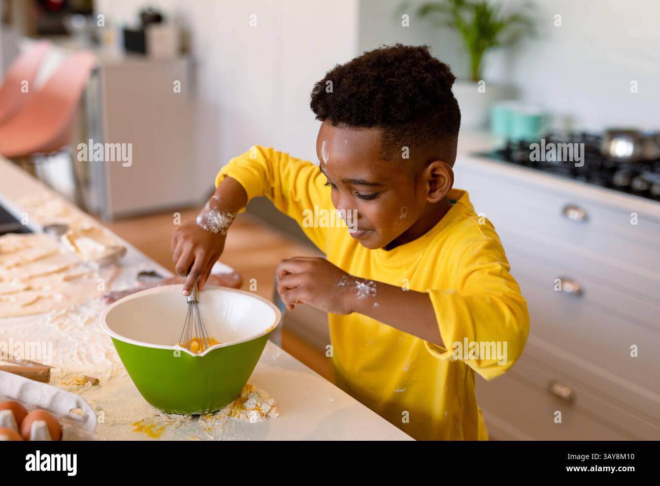 African american boy whisking hi-res stock photography and images - Alamy