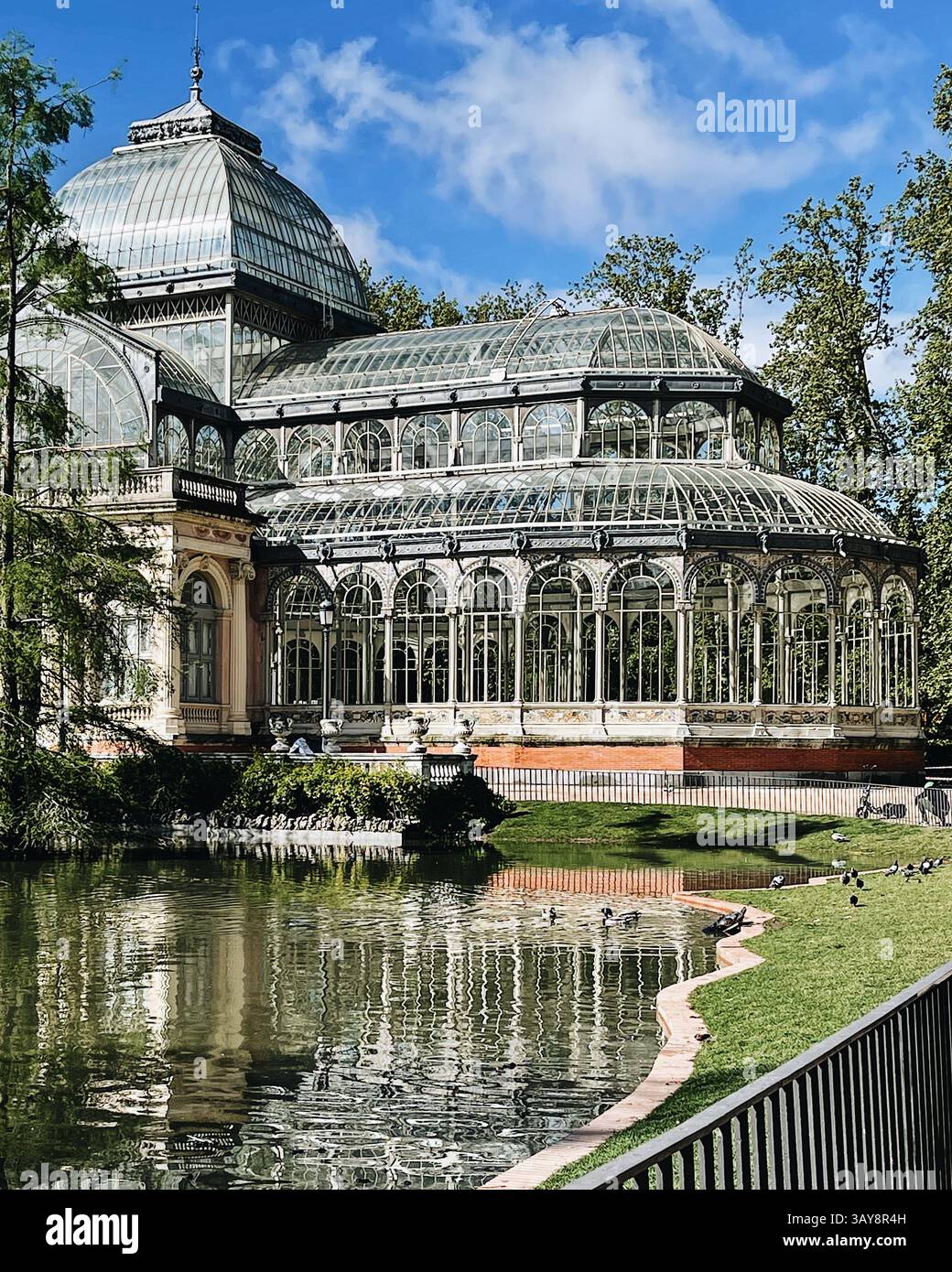 The Glass Palace in El Retiro Park, a UNESCO World Heritage Site, is ...