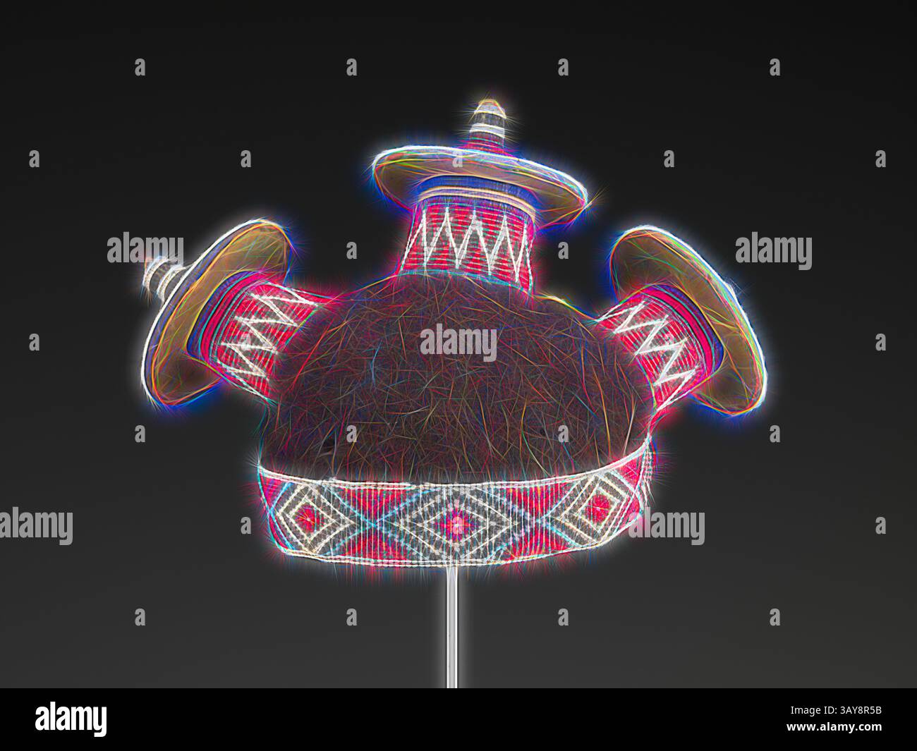 A decorative traditional hat featuring vibrant patterns and intricate ...