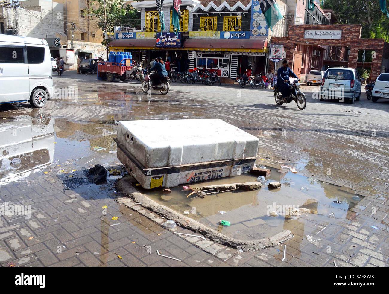 Inundated road by overflowing sewerage water, creating problems for ...