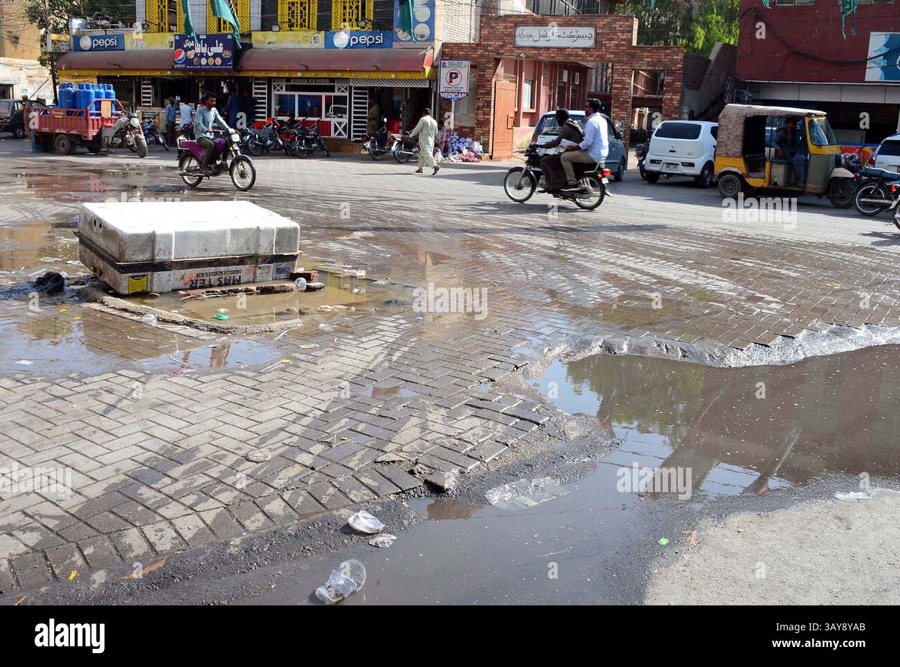 Inundated road by overflowing sewerage water, creating problems for ...