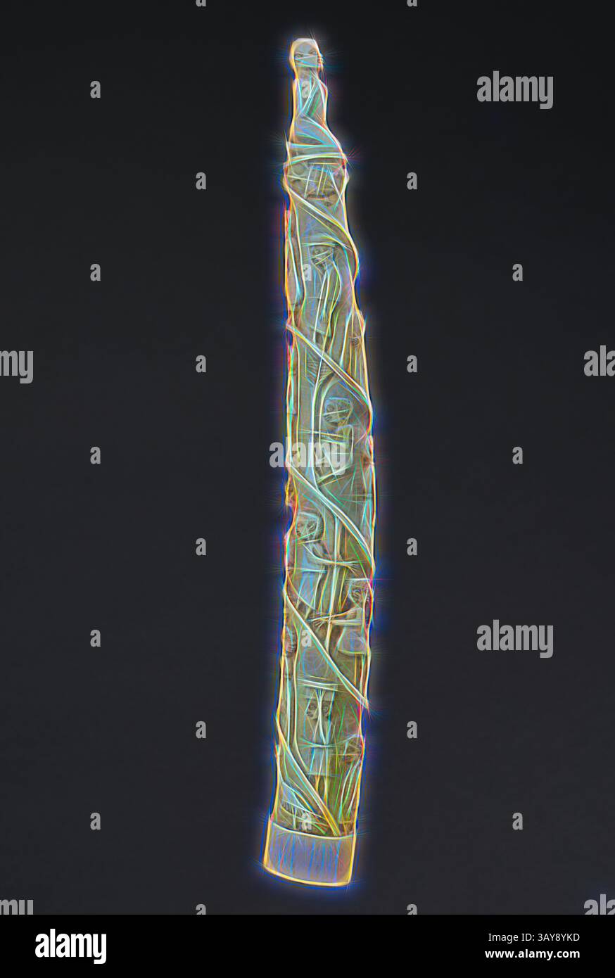 A tall, intricately carved object features detailed figures and ...