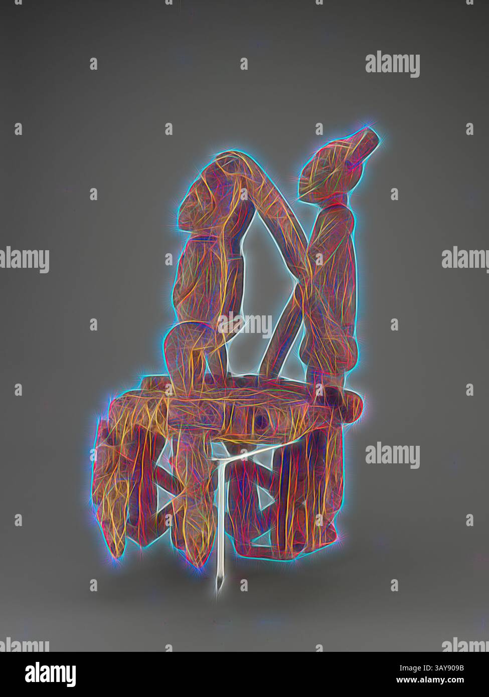 An intricately carved wooden sculpture features two stylized figures ...