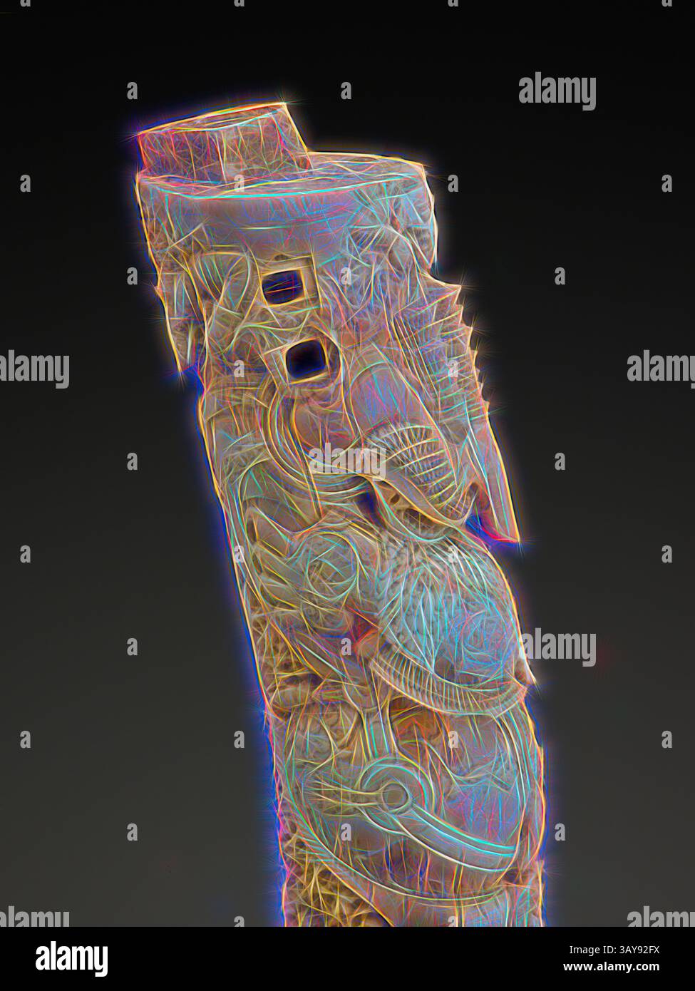 An intricately designed totem pole featuring detailed carvings and ...