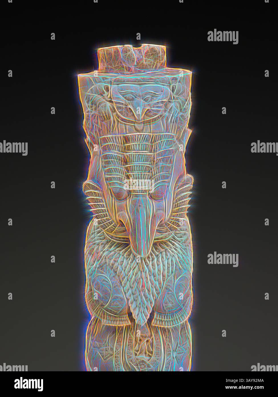 A intricately carved totem pole featuring detailed figures and symbols ...