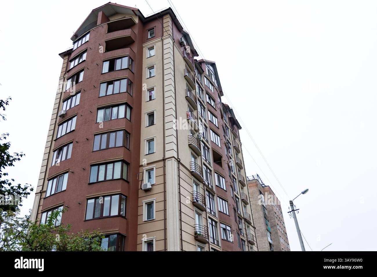 Unique architectural design of a modern apartment building stands ...