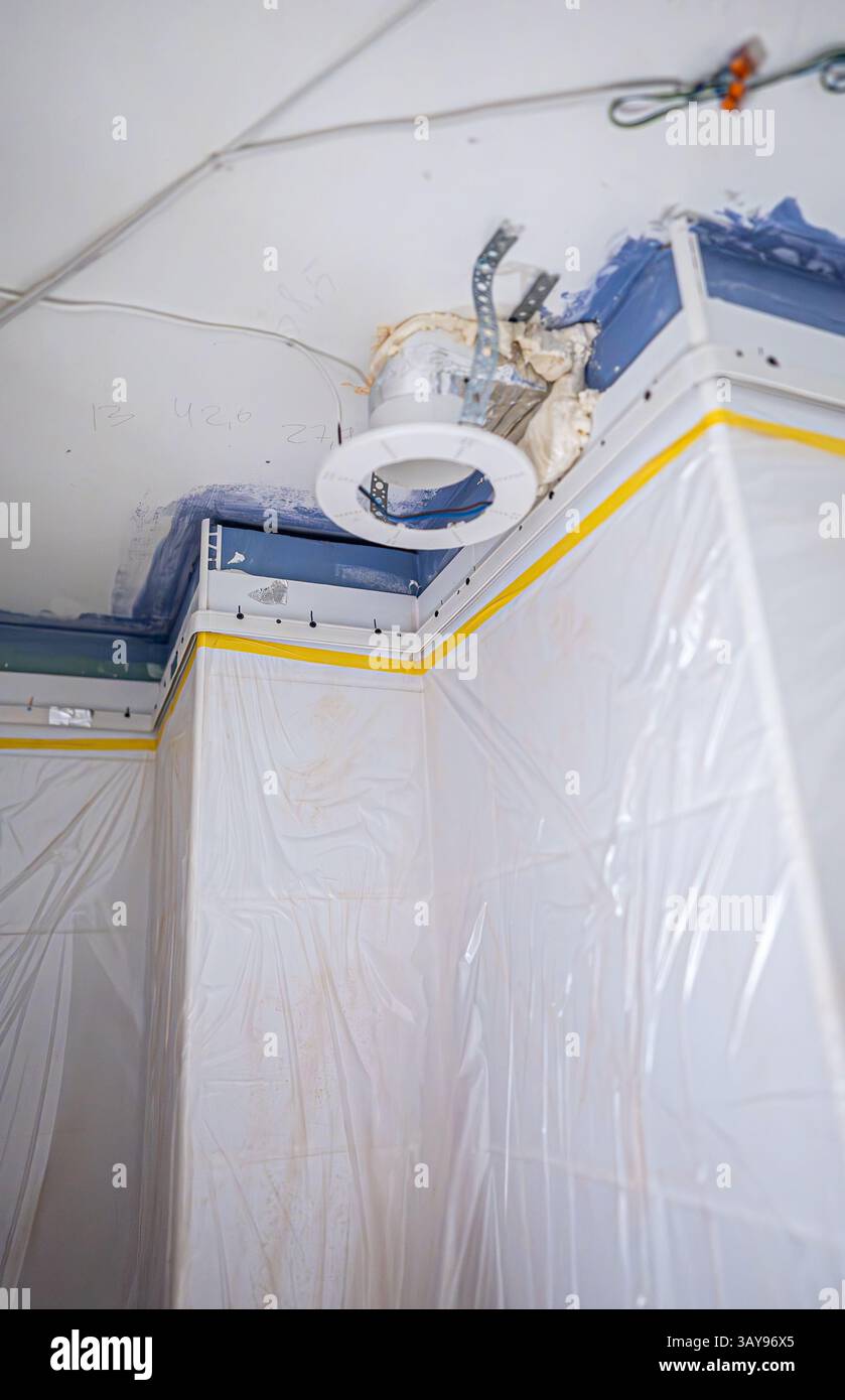 Stretch ceiling Installation in Progress in Bathroom Stock Photo - Alamy