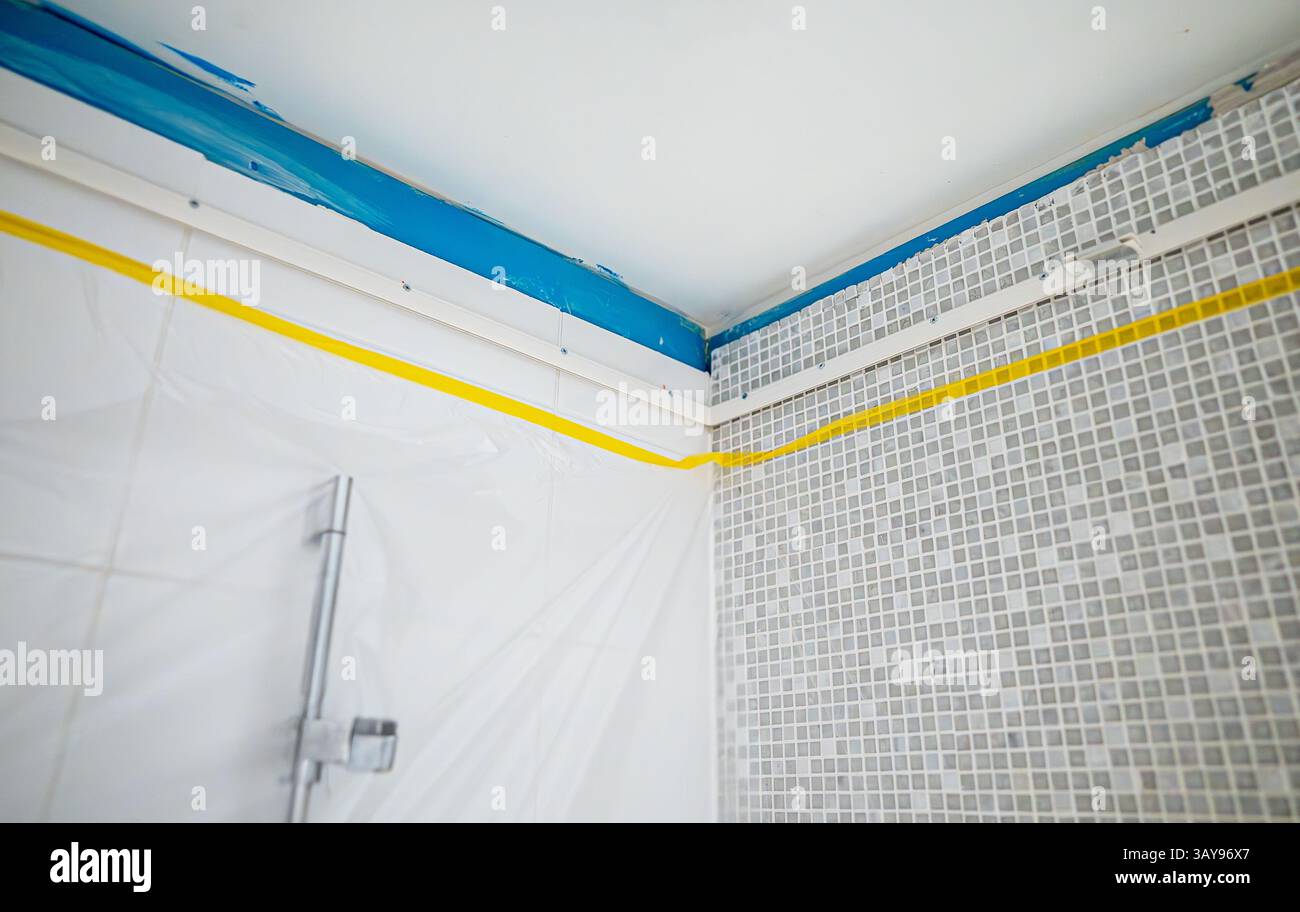 Stretch ceiling Installation in Progress in Bathroom Stock Photo - Alamy