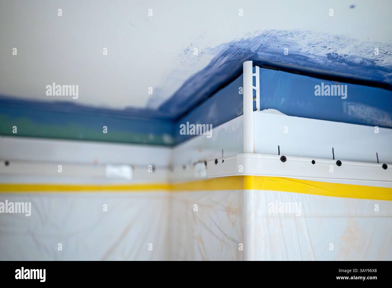 Stretch ceiling Installation in Progress in Bathroom Stock Photo - Alamy