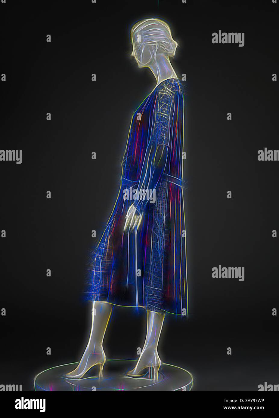 A stylish mannequin displays a flowing dress with intricate patterns ...